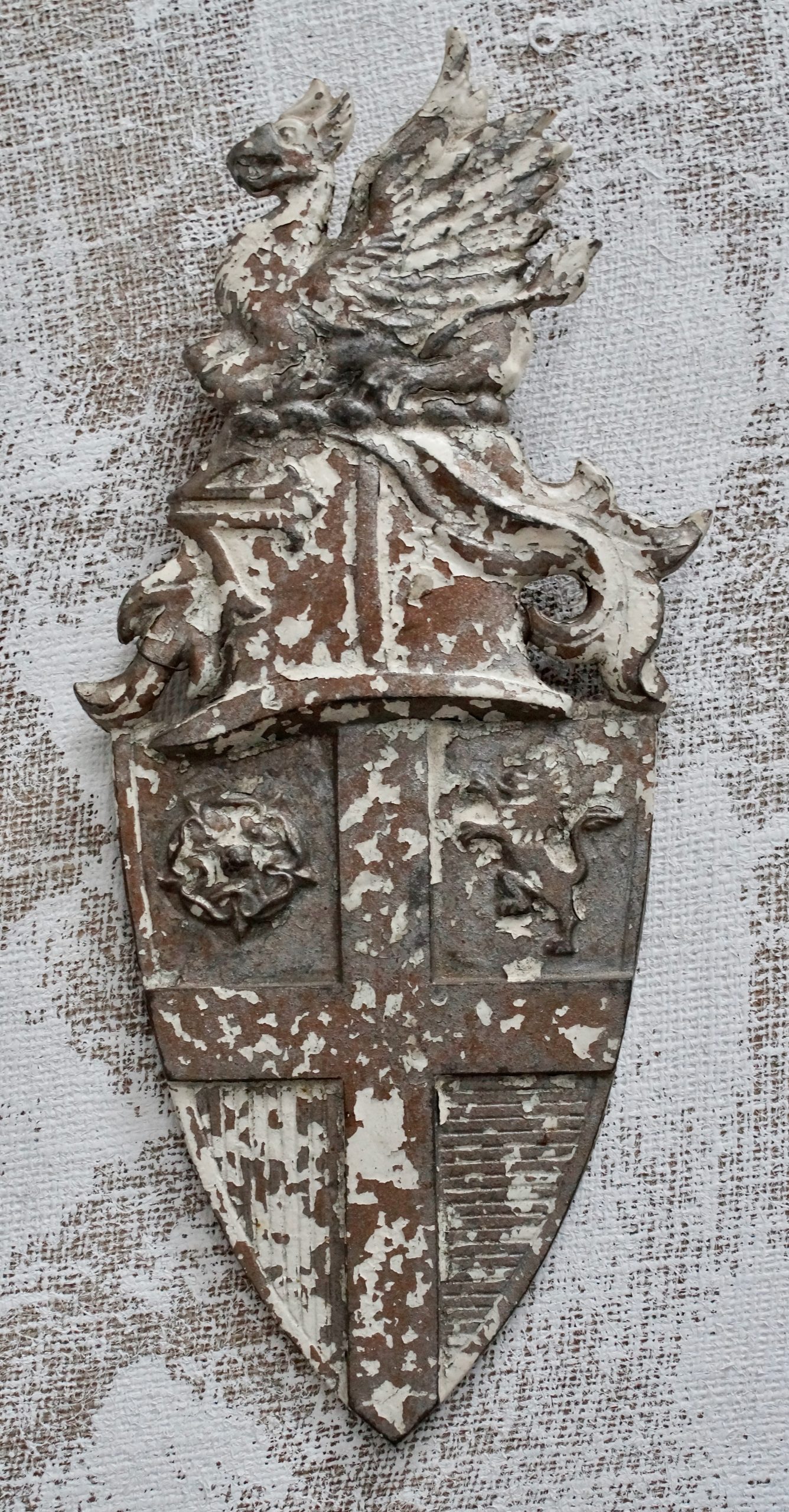 A Pair Of Heraldic Cast Shields (SOLD) – Clubhouse Interiors Ltd